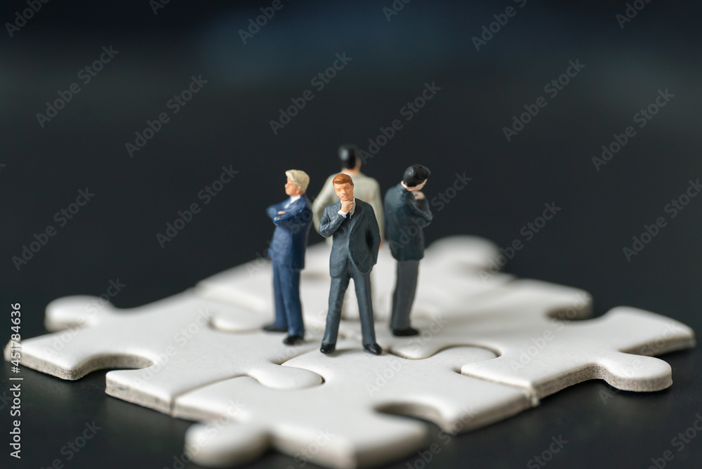Miniature people Group Business man mini figures standing thinking on ...