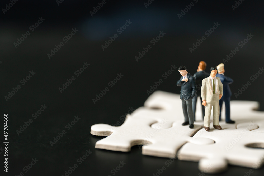 Miniature people Group Business man mini figures standing thinking on ...