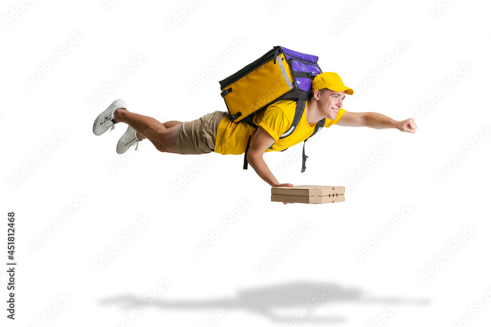 Young delivery man in yellow uniform flying to deliver order isolated ...