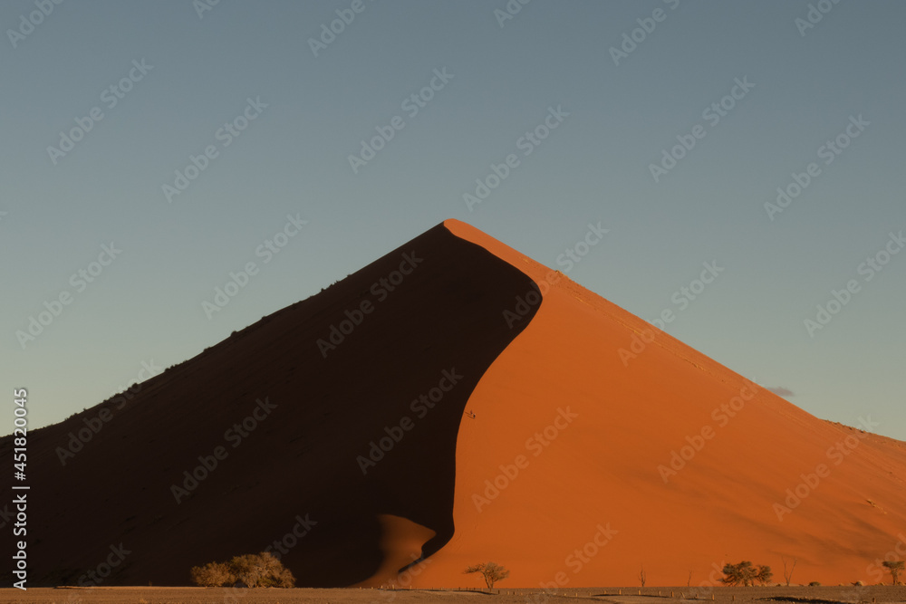 Huge red dune at Sossusvlei National Park, located in the arid Namib ...