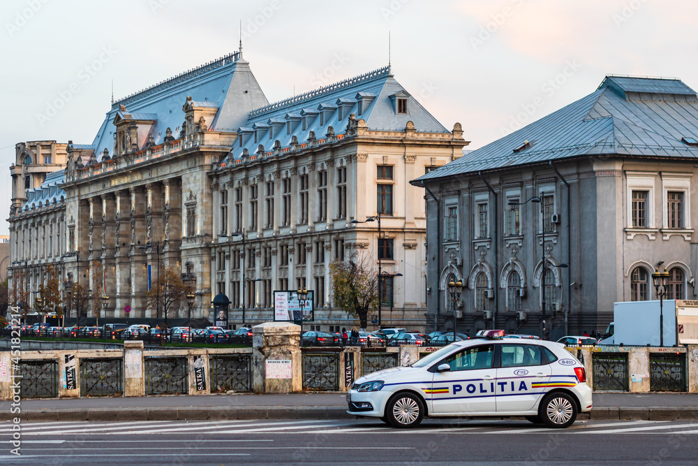 Romanian police (Politia Rutiera) car patrolling in downtown Bucharest ...