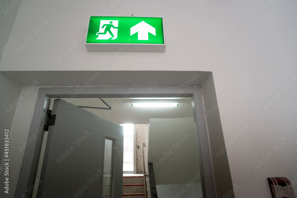Sign : Emergency exit sign at path way indoor building public facility ...
