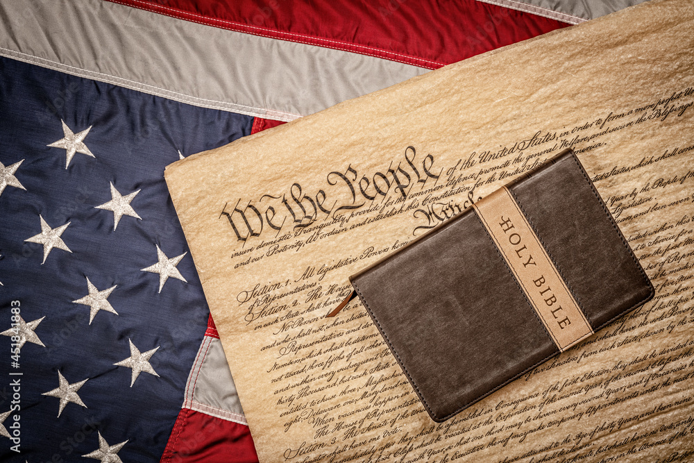 Holy bible on constitution and American Flag Stock Photo | Adobe Stock