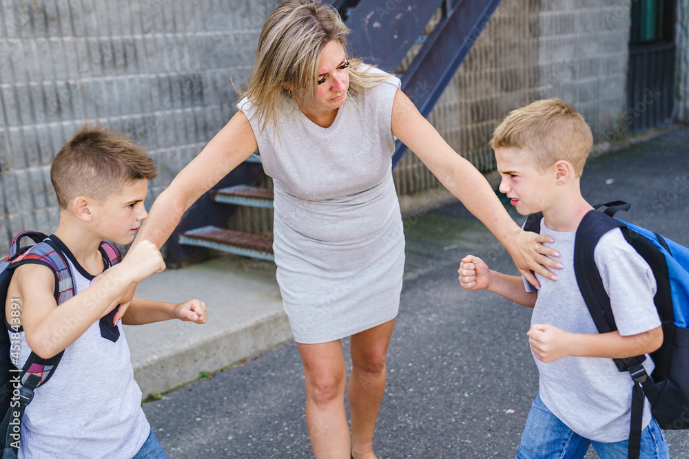 Children Fighting On Playground