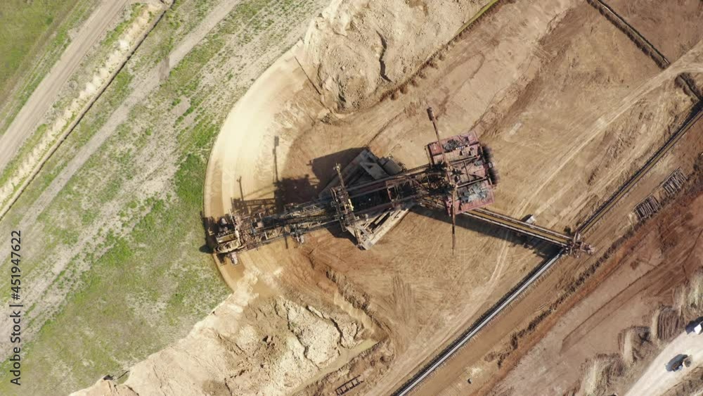 A large bucket-wheel excavator. Bucket-wheel excavator in open-cast ... A large bucket-wheel excavator. Bucket-wheel excavator in open-cast ...