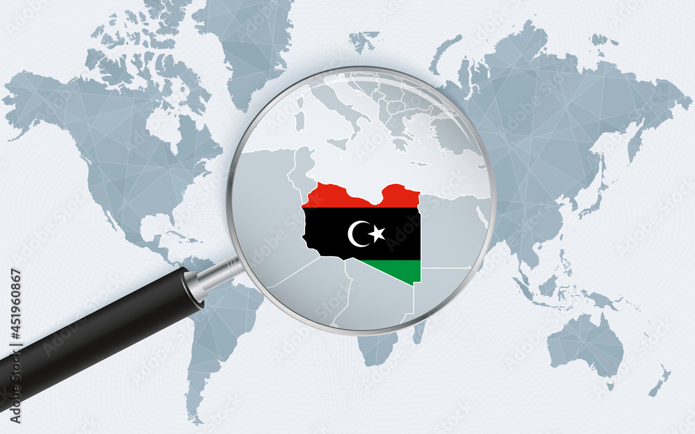 World map with a magnifying glass pointing at Libya. Map of Libya with ...