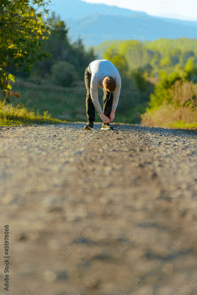 Running man jogging in rural nature at beautiful summer day. Sport ...