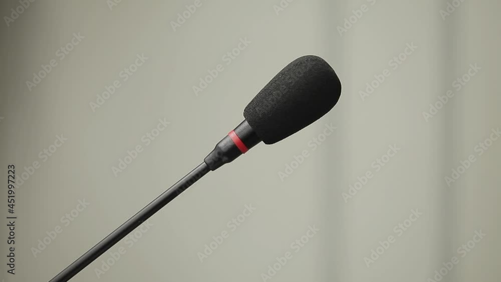 Professional microphone for a lecturer on a thin long leg. The device ...