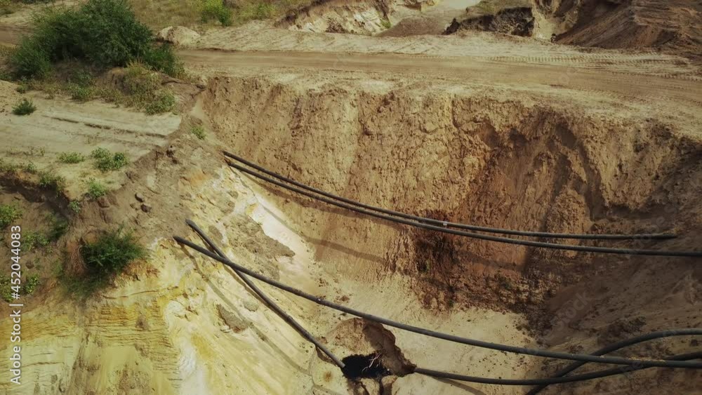 Protruding sewer pipes from the ground. An accident in the city ...