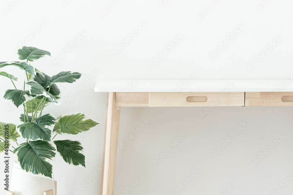 Minimal office workspace interior white table against white wall ...