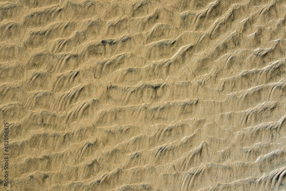 Sand texture., marks in the sand on the beach when the tide goes out ...