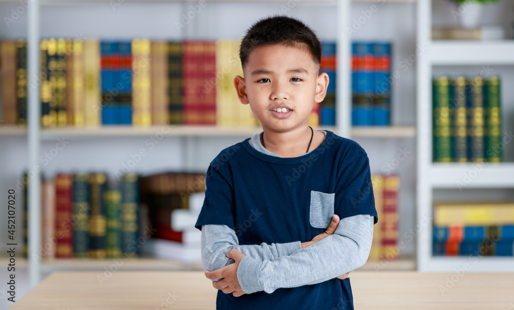 Smart Asian boy on grey sweater, denim blue shirt, confidently standing ...