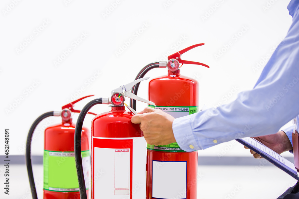 Fire extinguisher, Engineer inspection and checking pressure gauge ...
