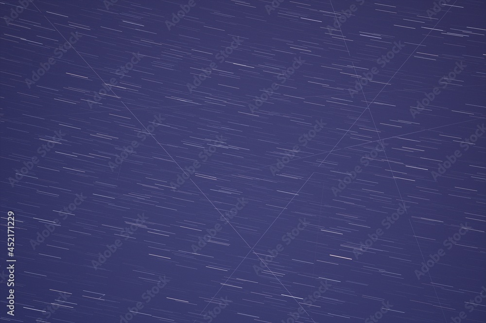 Beautiful stacked image of night sky with short star trails, falling ...