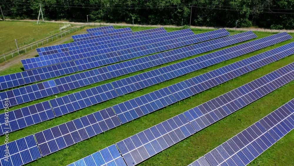 Photovoltaic solar cells at bright sun. Powerful station with solar ...