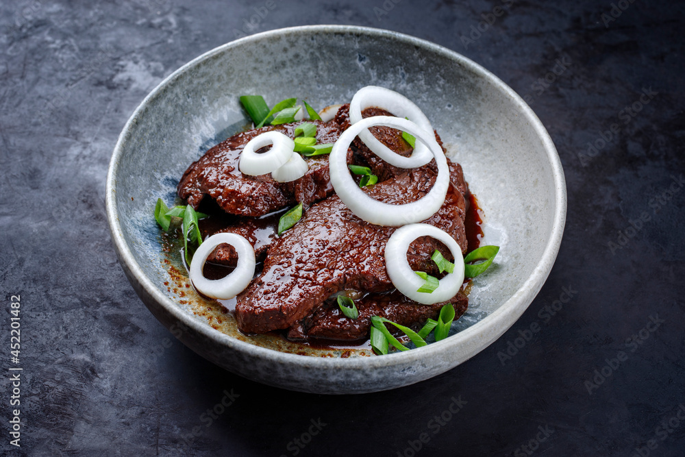 Modern style traditional Cuban dry aged angus bistec encebollado steak ...