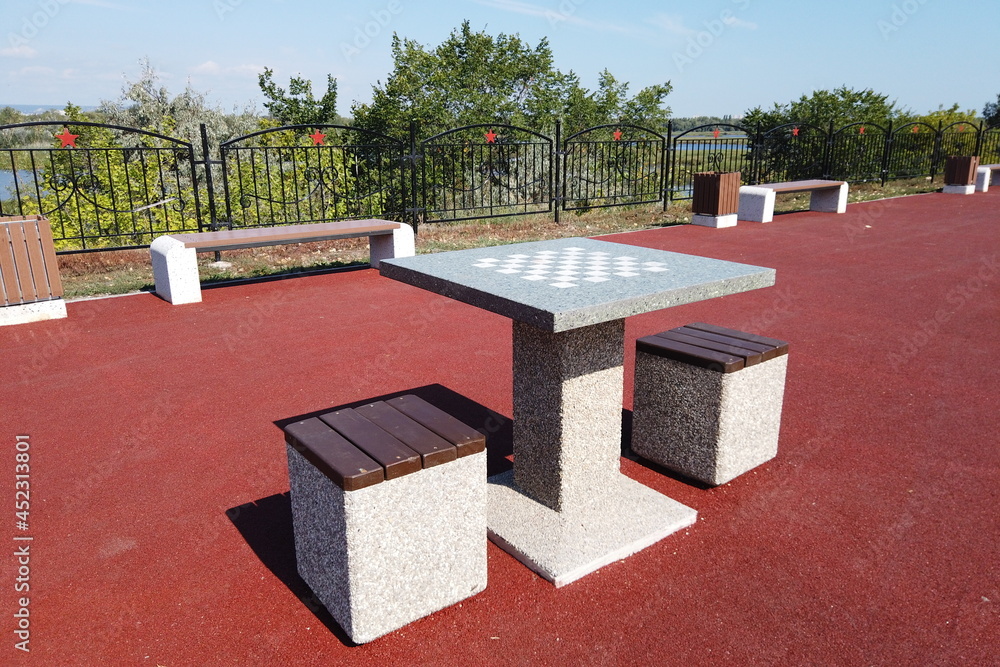 Concrete chess table for outdoor play. Chess playground in the city ...