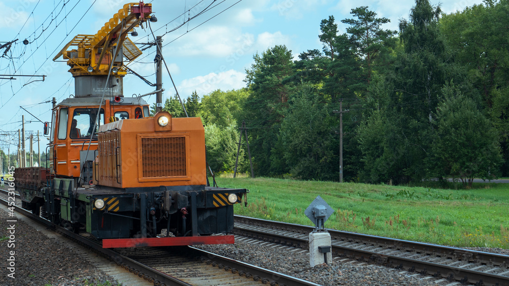 Special train with a landing crane for service and repair of electrical ...