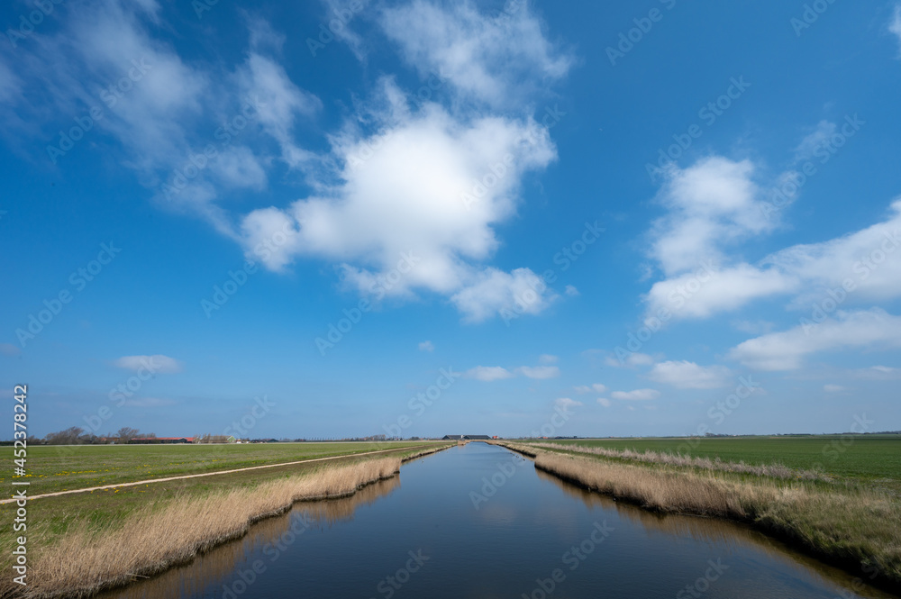 Dutch landscape, polders and water channels in Zeeland, Netherlands ...