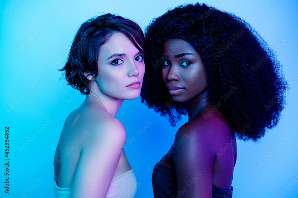 Profile portrait of two pretty gorgeous different persons turn head ...