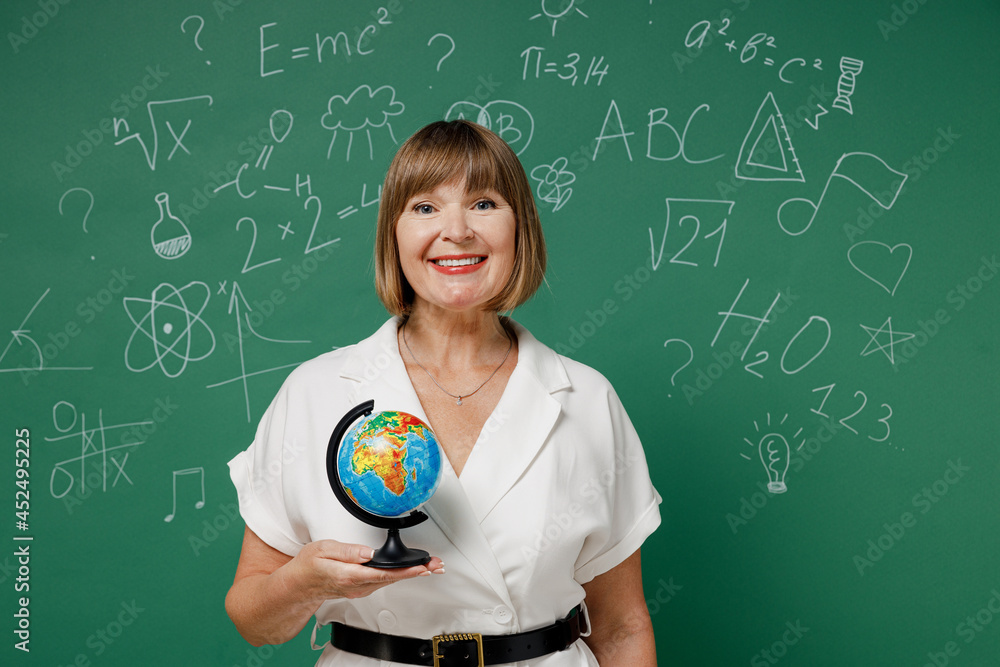 Smiling intelligent teacher mature elderly lady woman 55 wear white ...