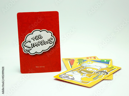 Playing card with the logo of the animated series The Simpsons ...