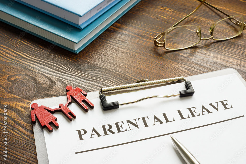 Parental leave form and family figures. Stock Photo | Adobe Stock