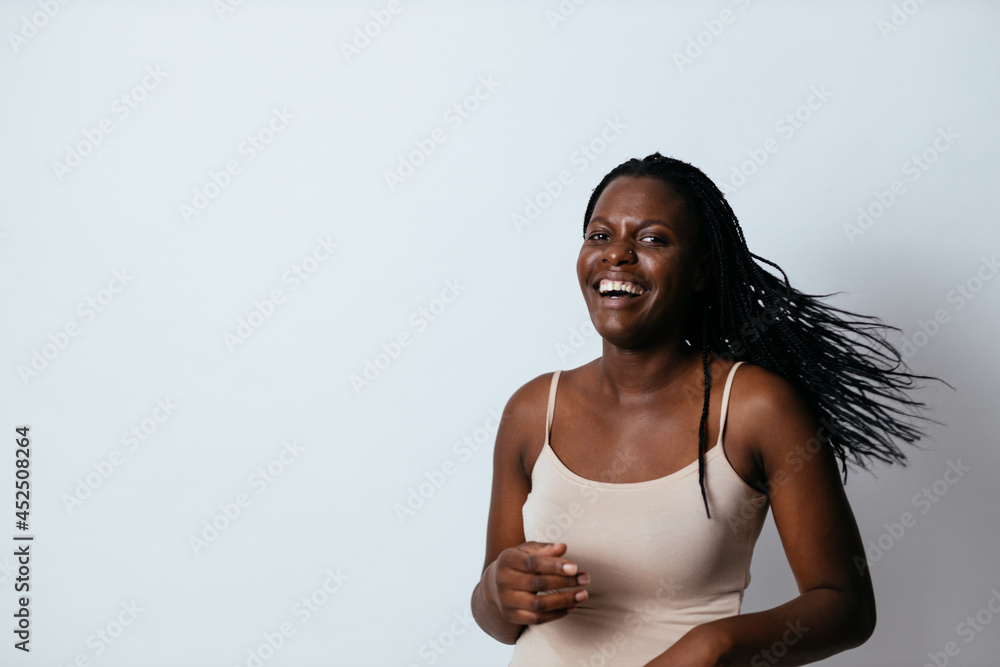 Beautiful girl posing in studio for a "body positivity" photo session ...