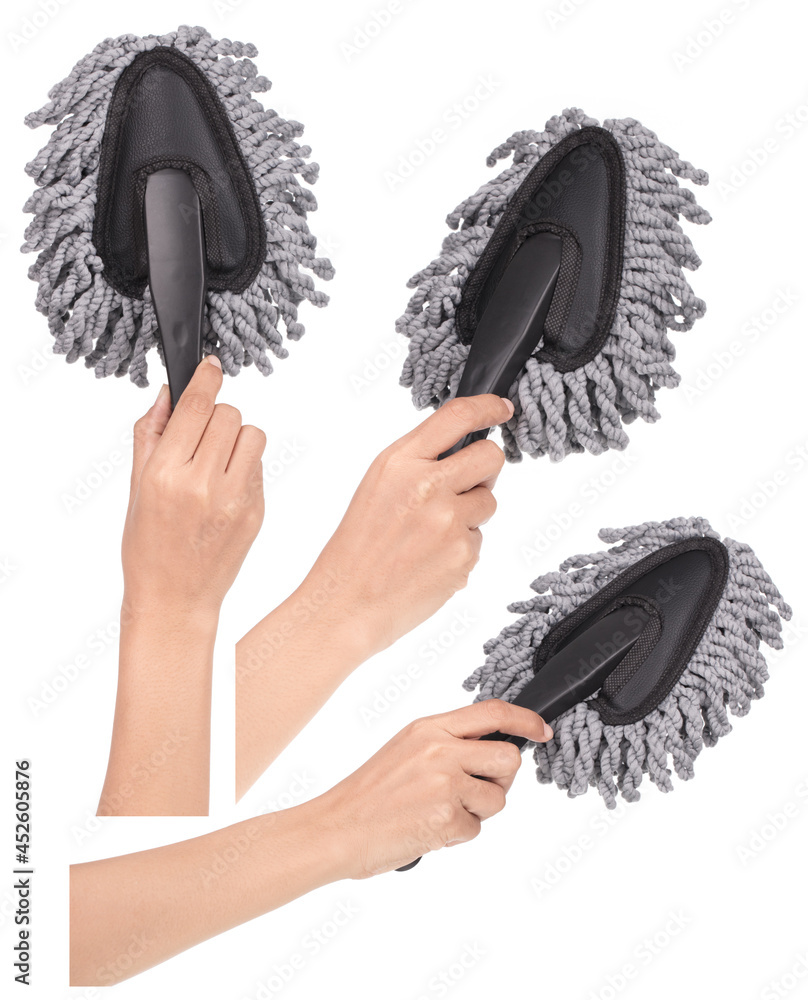 Collection Hand holding grey duster microfiber for cleaning the house ...