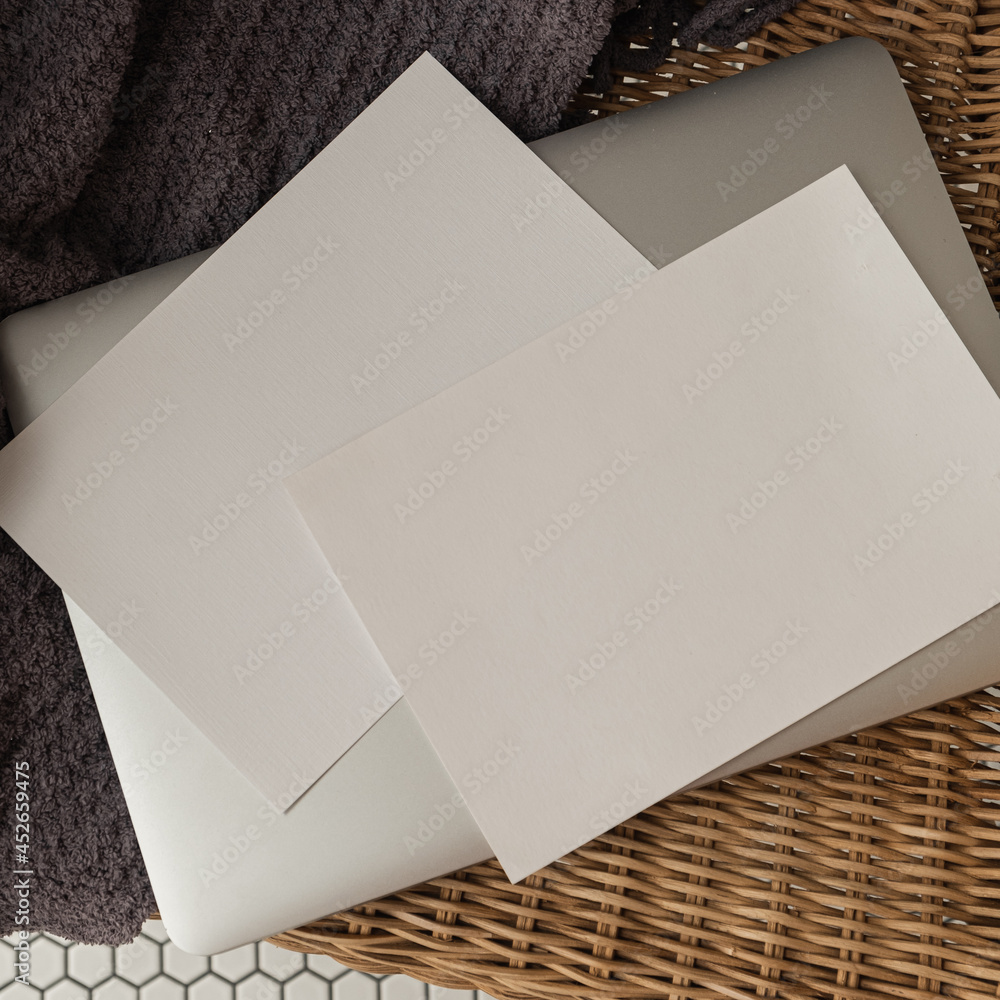 Blank paper sheet card with mockup copy space, laptop computer and ...