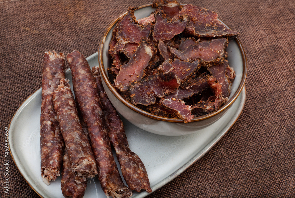 traditional South African Cured meat snacks, Biltong and dry wors, in ...