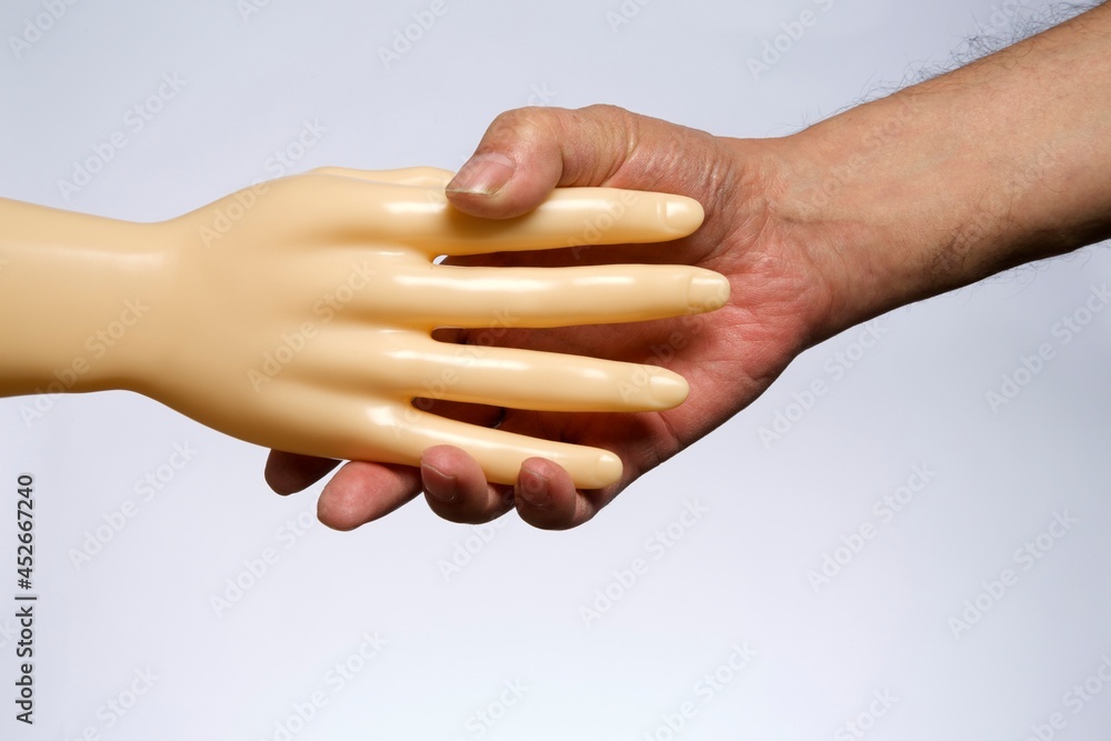 Human hand shaking artificial hand Stock Illustration | Adobe Stock