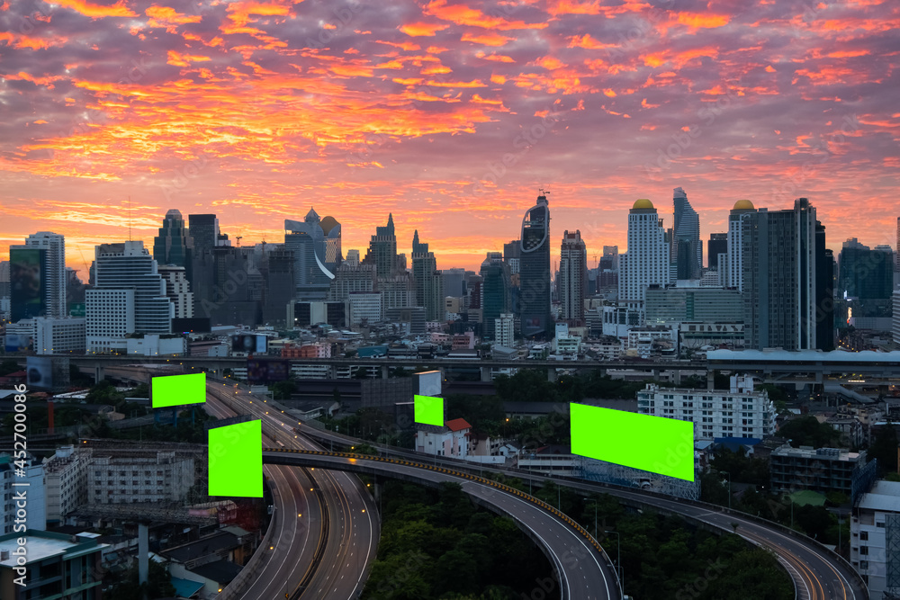 City skyline and green screen advertising billboard in morning Stock ...