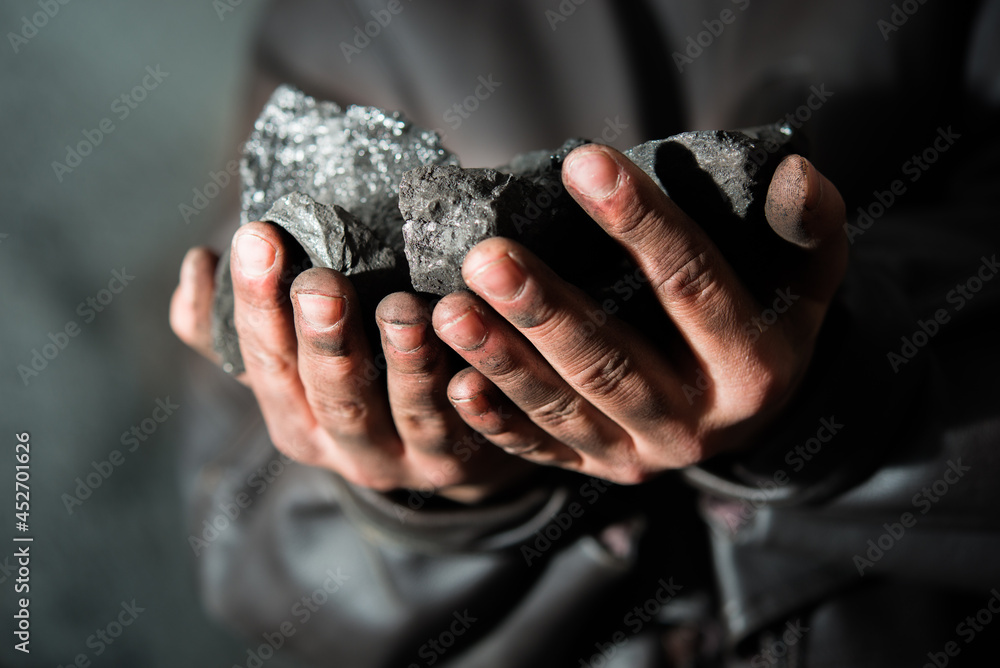 Coal mining : coal miner in the man hands of coal background. Picture ...