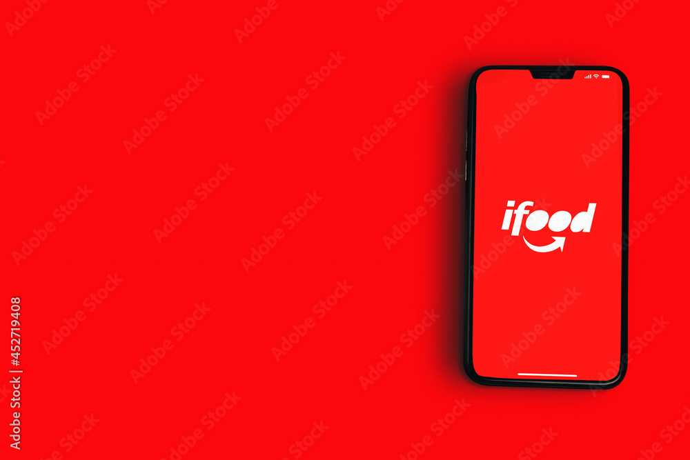 Ifood app on smartphone screen on red background. Ifood logo, online ...