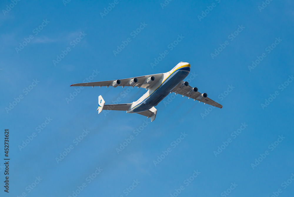 Aircraft Antonov An-225 Mriya flying in blue sky under the Kiev during ...