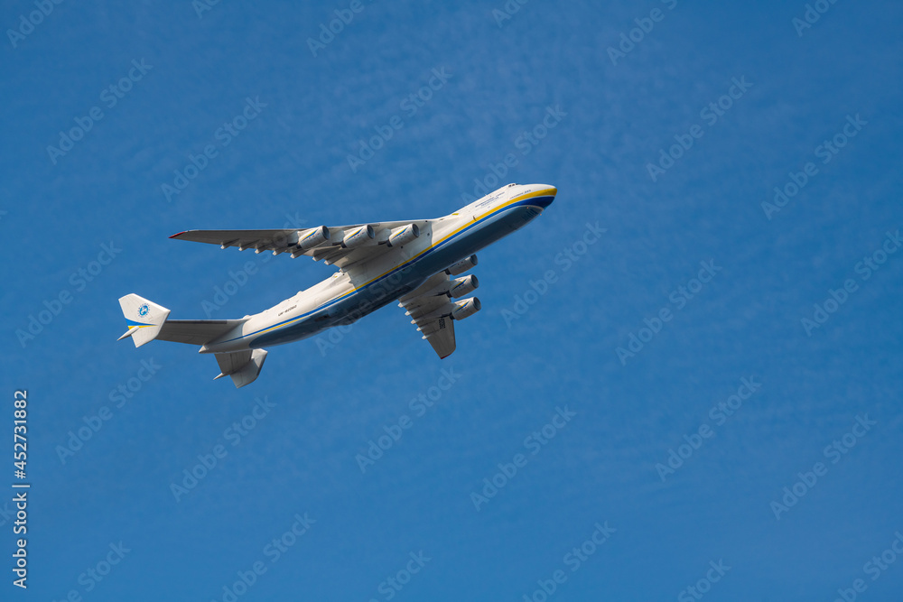 Aircraft Antonov An-225 Mriya flying in blue sky under the Kiev during ...