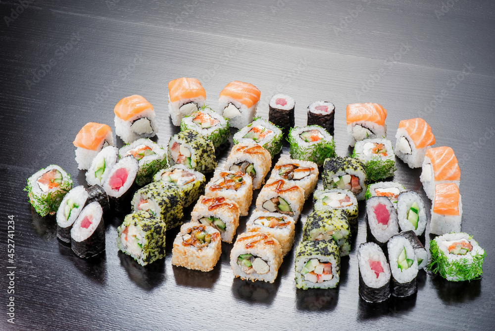 Sushi set isolated on black background. Photo for the menu and site ...