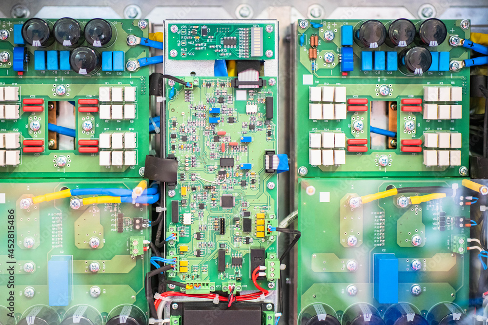 Electronic board top view. Electronic board with many capacitors. Multi ...