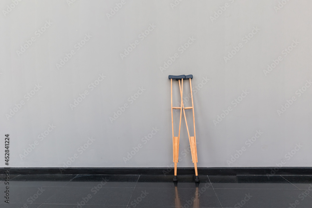 pair wooden crutches or medical walking sticks for rehabilitation of ...