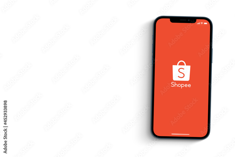 Shopee app on the smartphone screen isolated on white background. Top ...