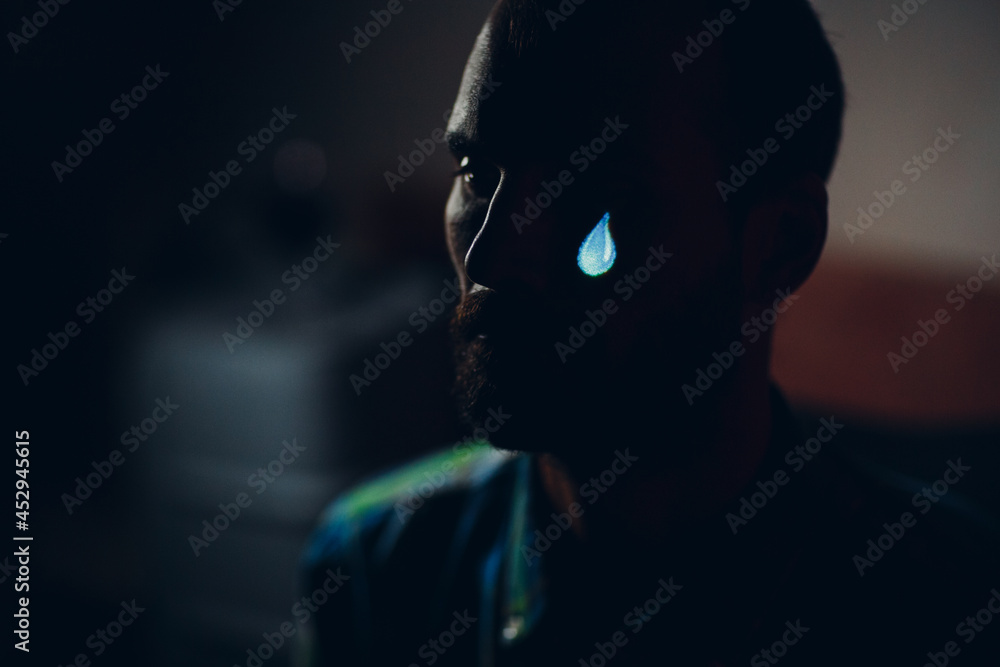 Crying sad man portrait with tears in eye Stock Photo | Adobe Stock