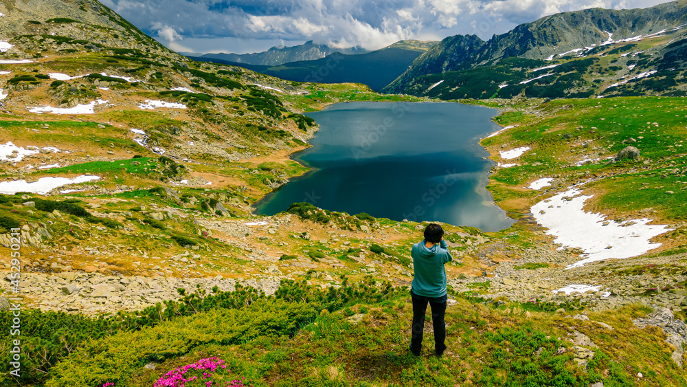 Landscape photography in an mountain range with a female photographer ...