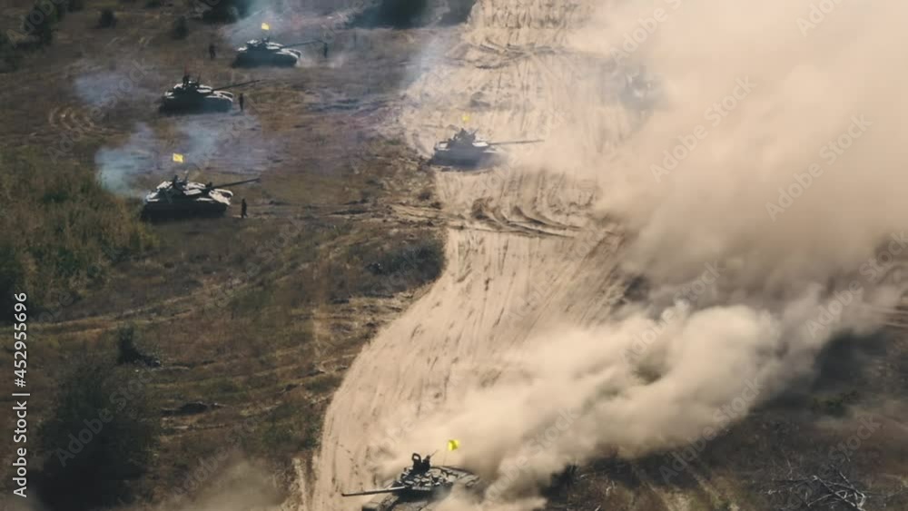 Strategic military war training with armored tanks on battlefield area ...