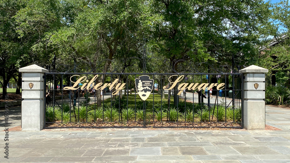 Charleston, South Carolina, USA: Liberty Square entrance gate and sign ...
