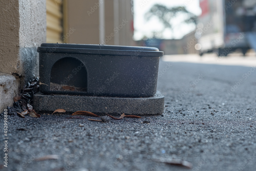 Rodent bait station in use outdoors at a storage unit facility Stock ...