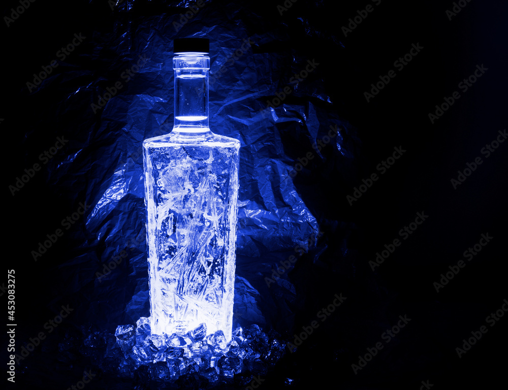 tall rectangular bottle with rounded corners. ice patterns on the walls ...