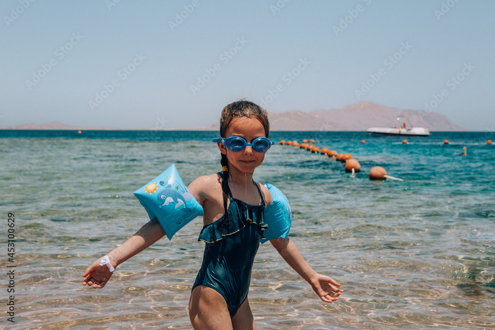 child on the beach Stock Photo | Adobe Stock