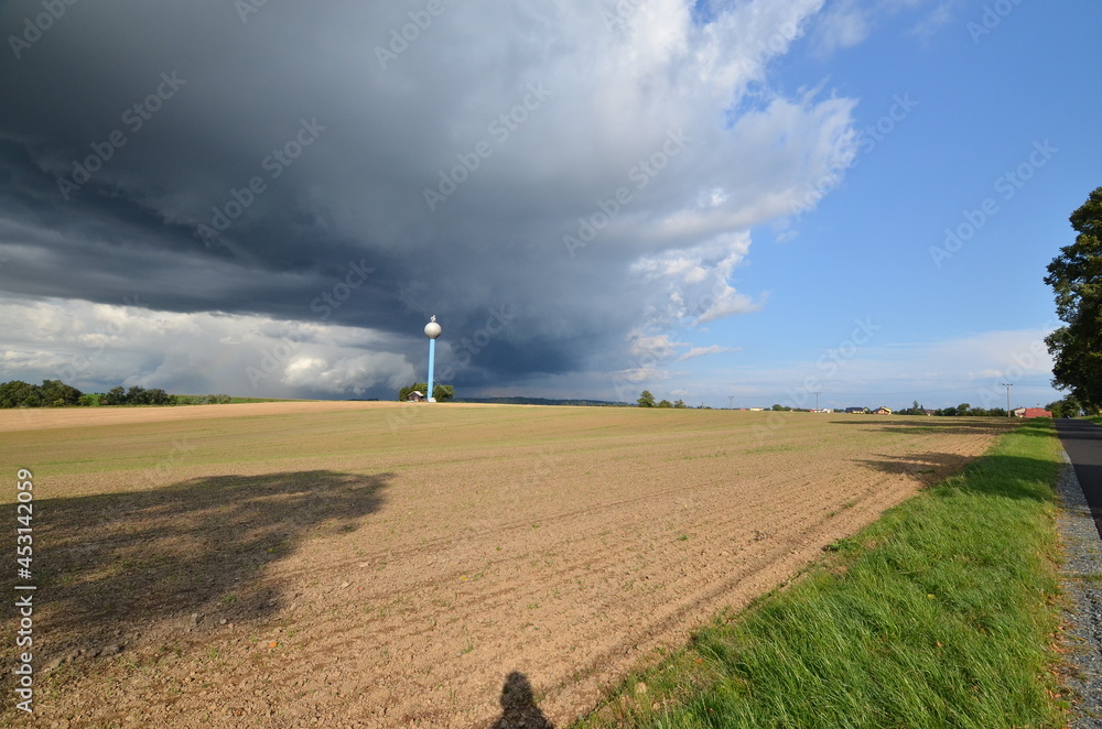 Dark storm clouds cumulonimbus from a supercell thunderstorm during a ...