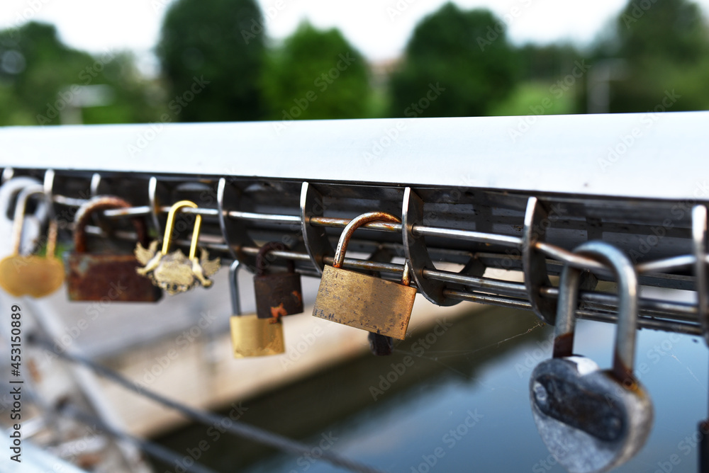 Padlock on Lovers Lock Bridge. Husband and wife during the wedding hung ...